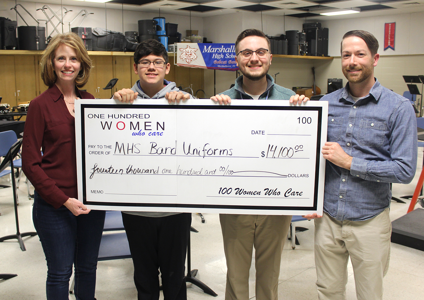 100 Women Who Care group donates $14,100 toward new MHS marching band ...